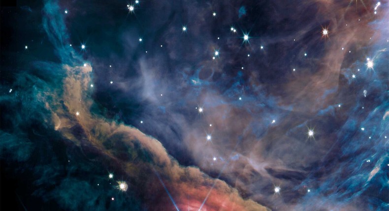 Side-by-side photos of the Orion Nebula show how powerful Webb's infrared cameras are. They spot ...