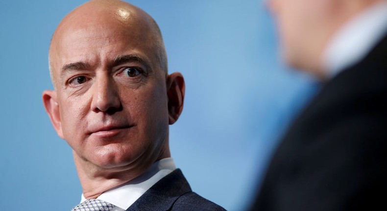 Protesters set up a guillotine outside Jeff Bezos' mansion and demanded ...