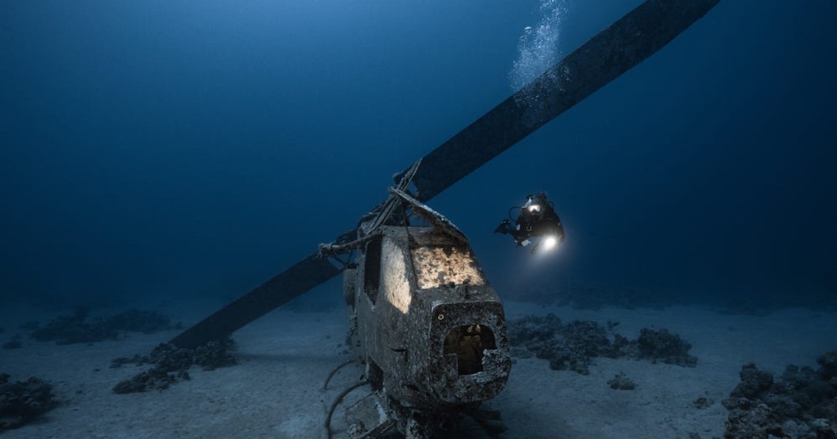10 award-winning photos capture eerie underwater scenes of shipwrecks ...