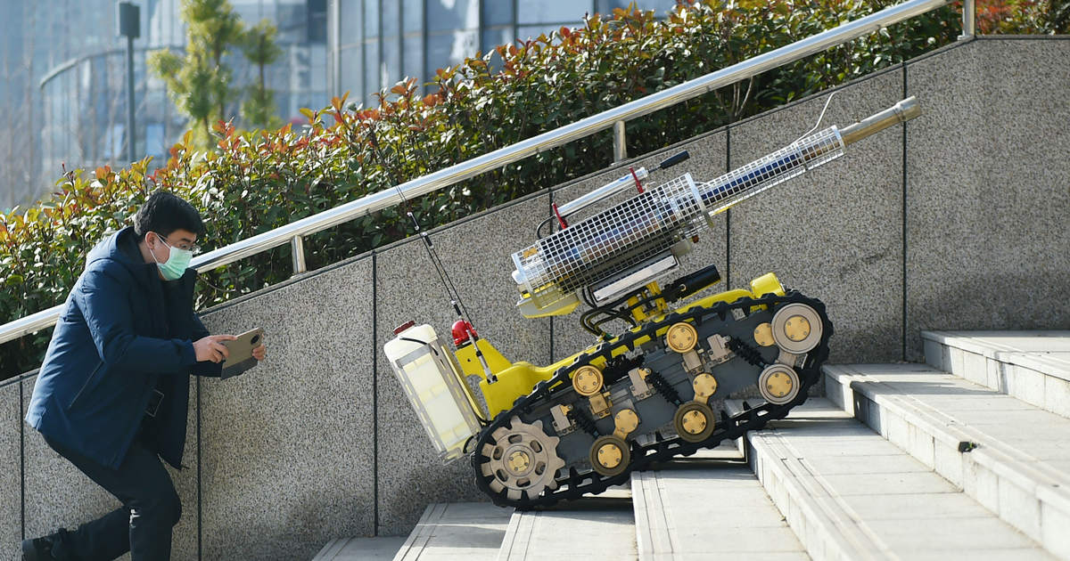 These robots are fighting the coronavirus in China by disinfecting ...