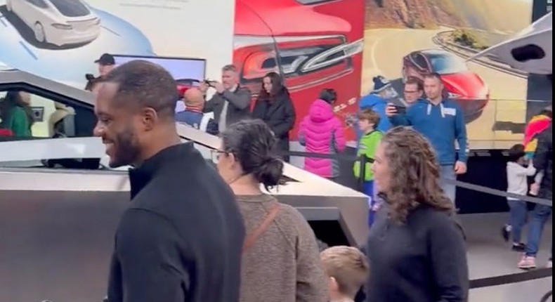 Tesla fans are lining up outside showrooms to catch a peek of the new ...