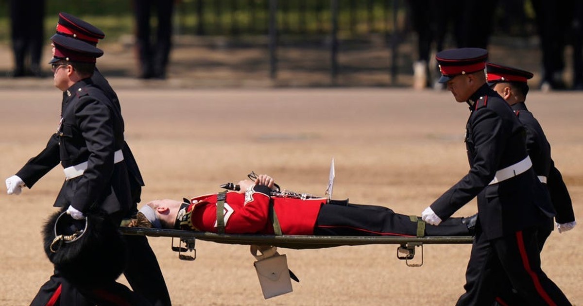 Multiple British soldiers fainted in the heat as they turned out for a ...