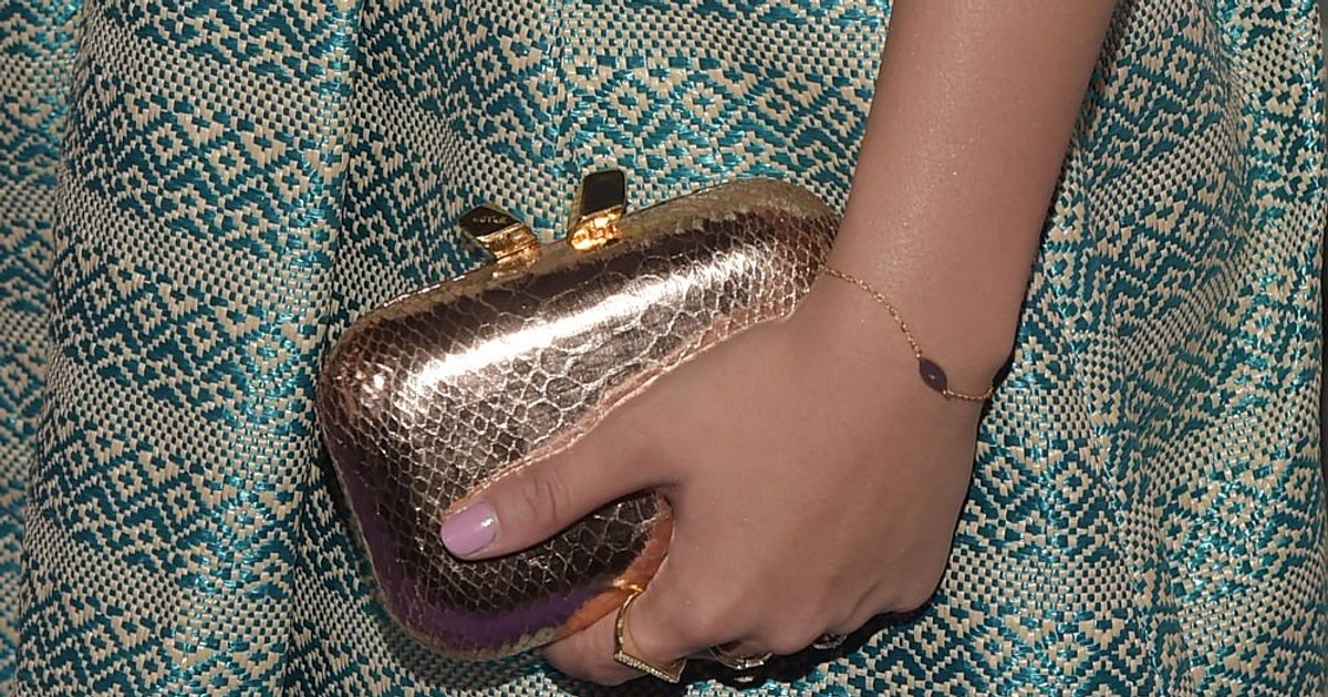 A missing purse filled with love letters and prom photos was returned ...