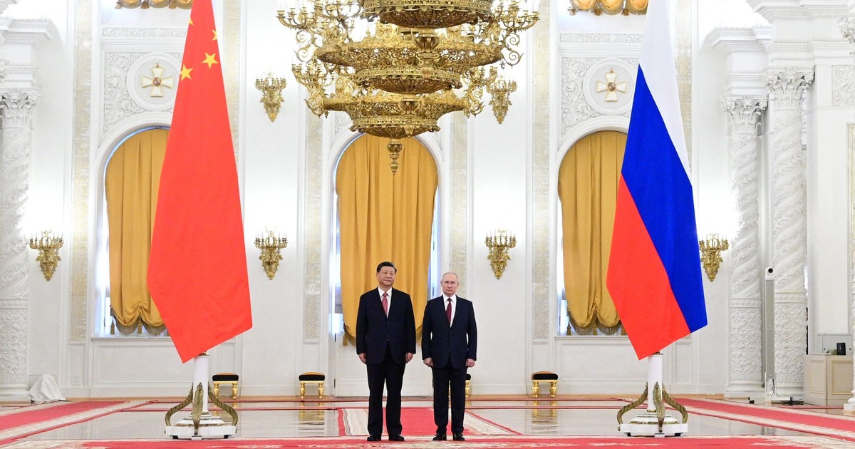 Photos from Putin's big meeting with China's Xi show no absurdly long ...