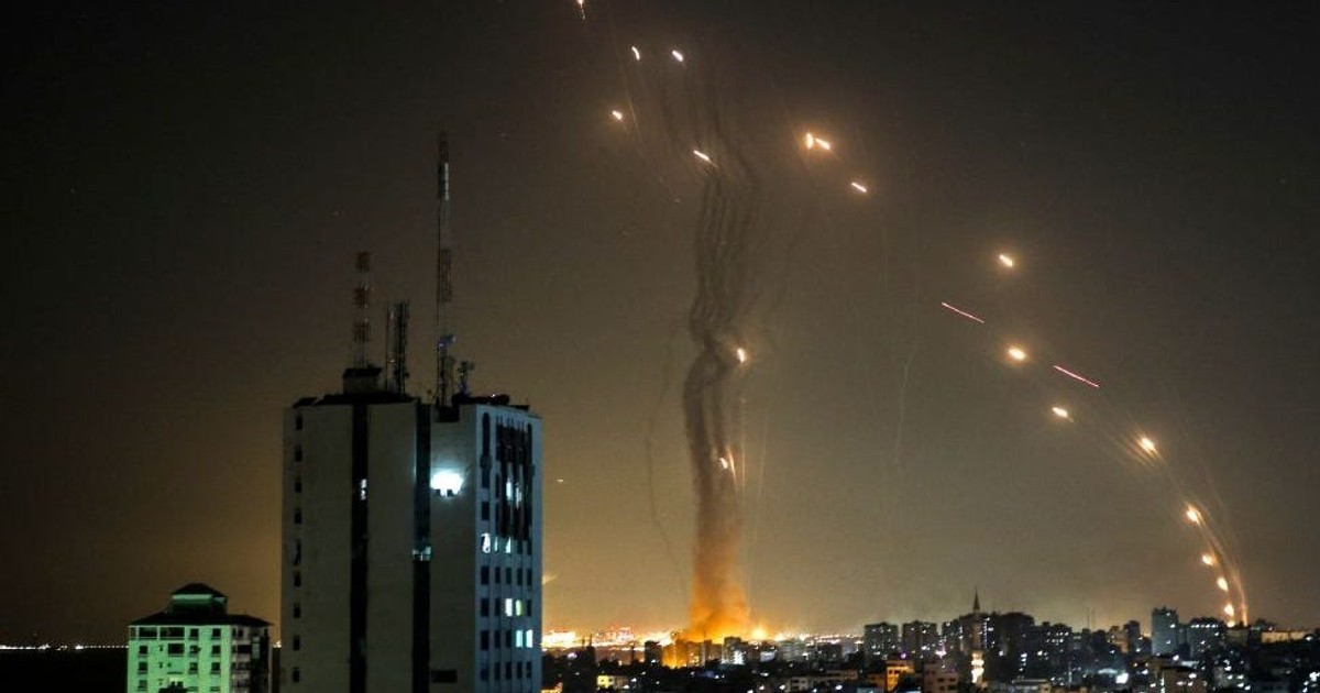 Video shows Iron Dome interceptors filling the sky as more than 100 ...