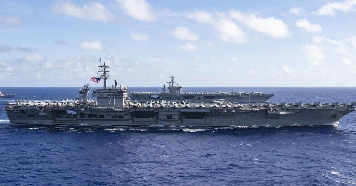US Navy carrier strike groups team up in back-to-back dual carrier operations in the Pacific to ...