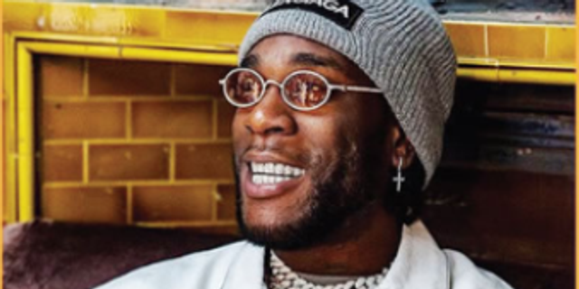 Burna Boy honours late friend Gambo with customised diamond chain ...