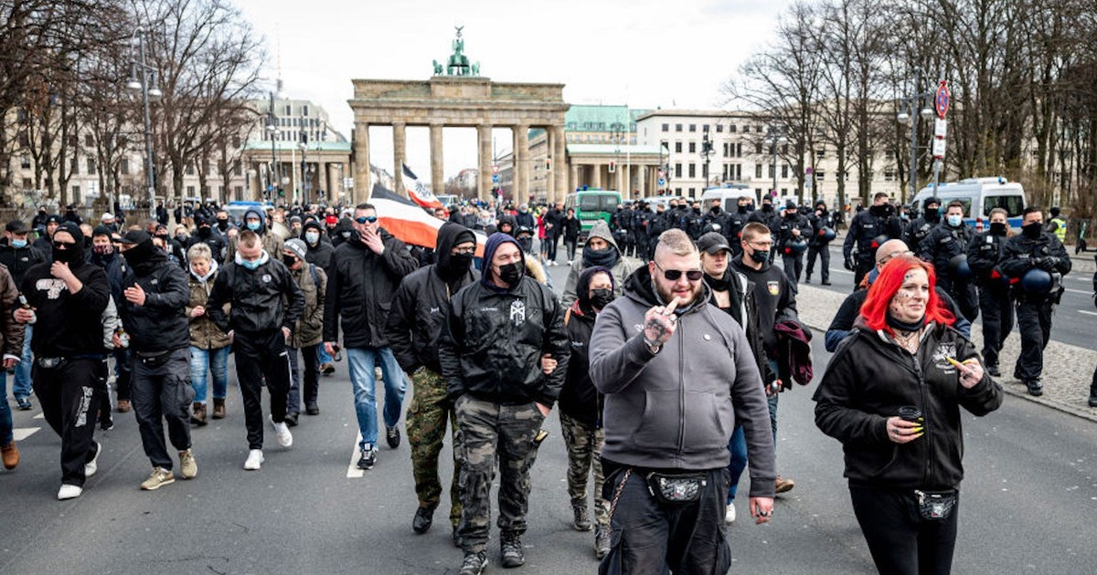 A 75-year-old woman who led far-right extremists accused of an ...