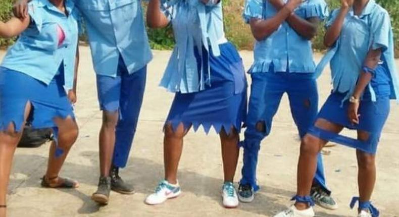 Students cause a stir after ripping up their uniforms to celebrate ...