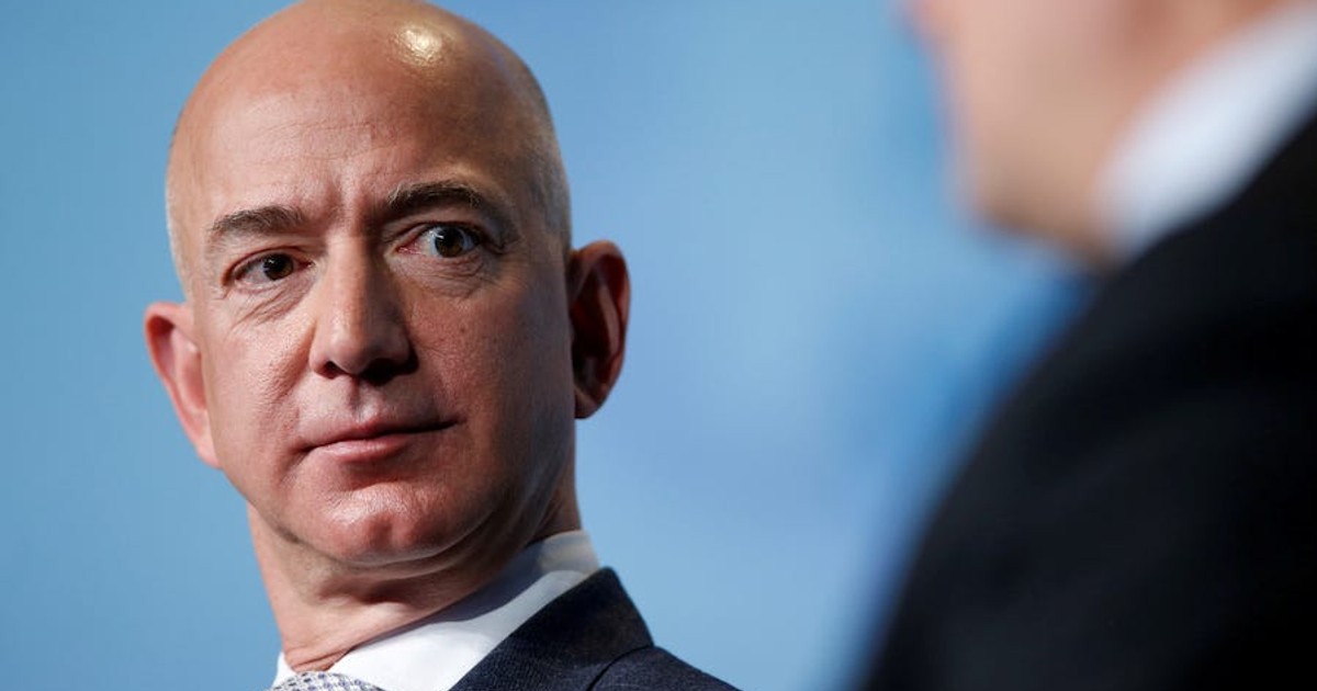 Protesters set up a guillotine outside Jeff Bezos' mansion and demanded ...