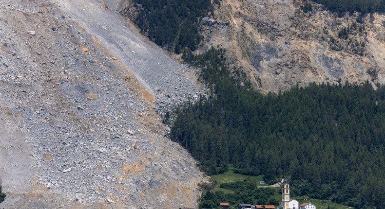 Images show how a Swiss Alps village narrowly escaped being wiped out ...