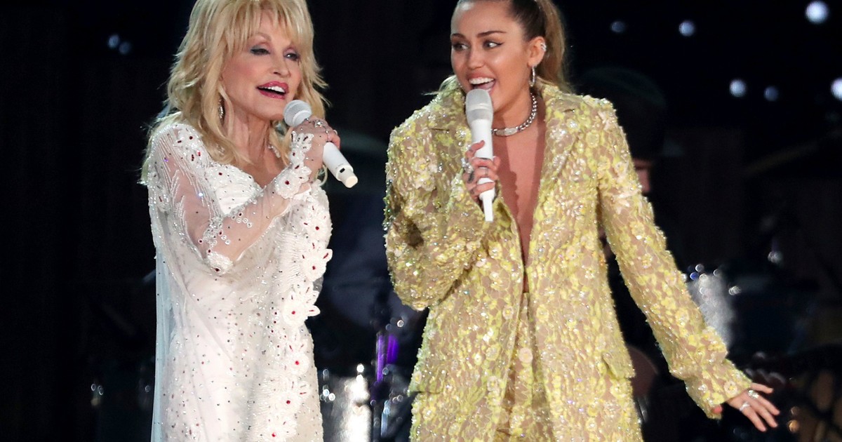 Dolly Parton is Miley Cyrus' godmother. Here's the story behind their relationship. | Business ...