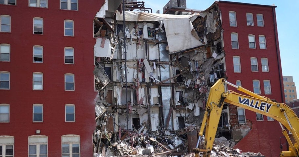 A woman who survived her apartment building's collapse said she saw a ...