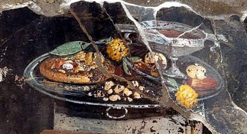 Sorry, pizza purists — a fresco from Pompeii shows Romans were eating a ...